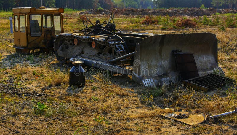 A Rusted and Abandoned Rusty Tractor. Dead Radioactive Zone Stock Photo ...