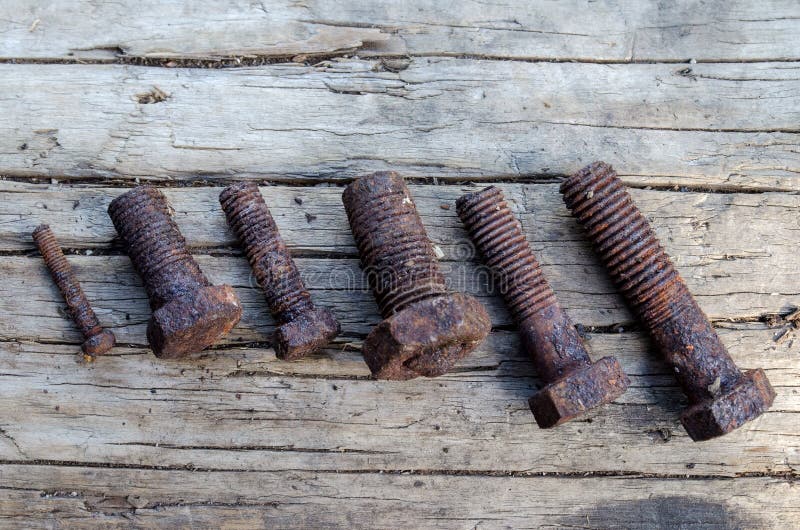 Rusted bolts stock image. Image of rusty, bolt, board - 57891729