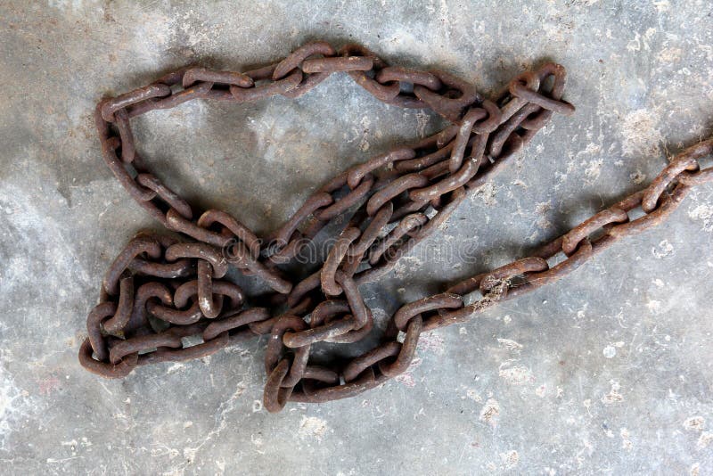 Rusted Chain on Concrete Ground Stock Image - Image of black, loop ...