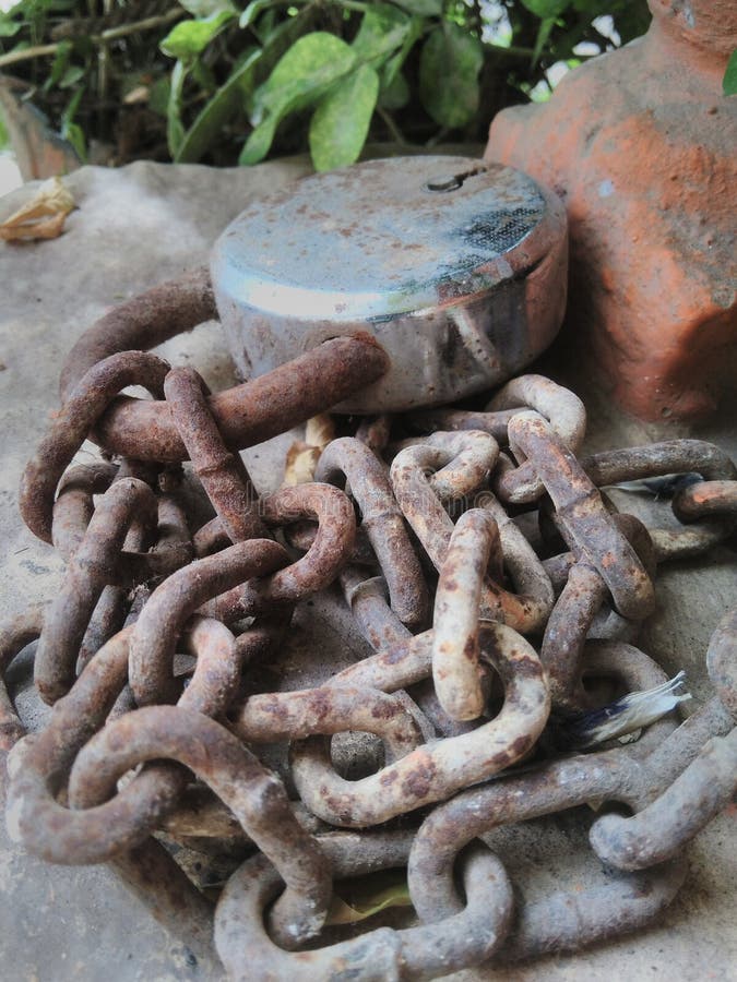 Rusted chain and lock stock image. Image of cement, lock - 75070175