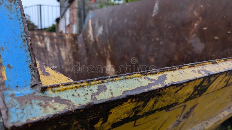A Rusted Corner of an Empty Skip Recycling Bin Dumpster with Ladder ...