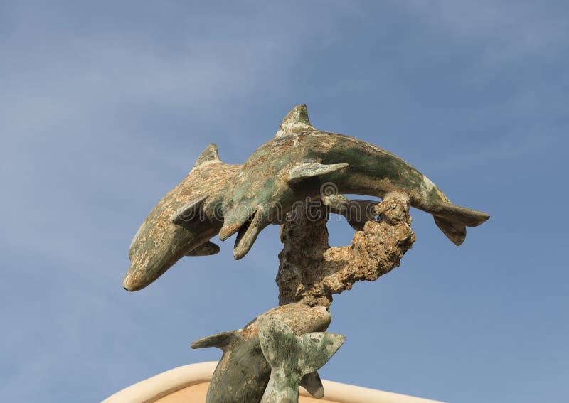 Rusted Dolphin Statue stock image. Image of blue, marine - 98674221