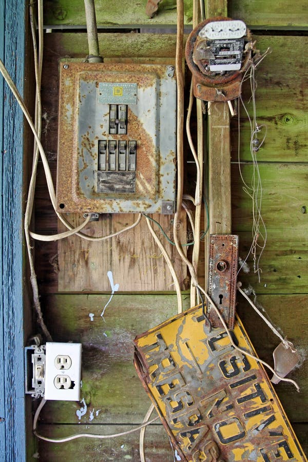 Old Rusted Electrical Panel with Fuses and Contacts in an Abandoned ...