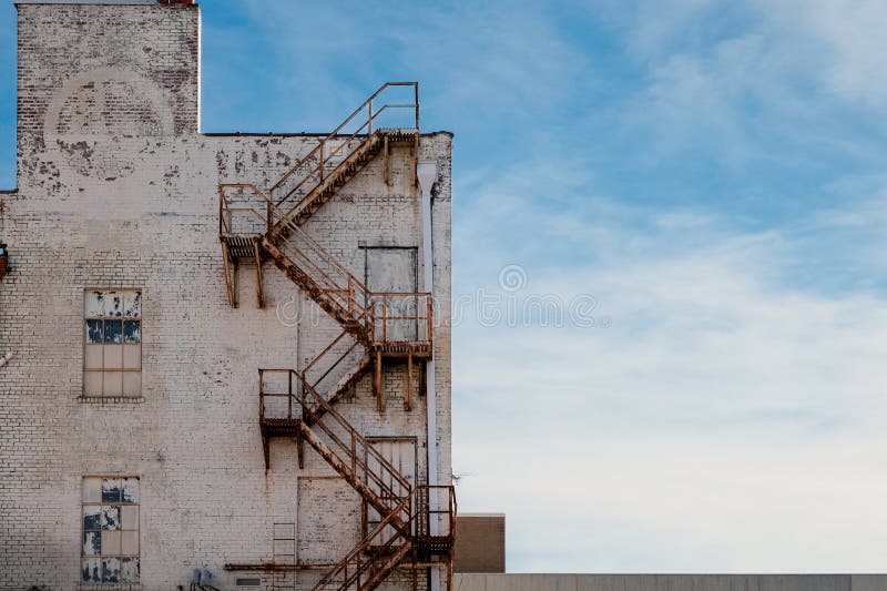 Rusted Fire Escape on Facade of Old Industrial Building Stock Image ...