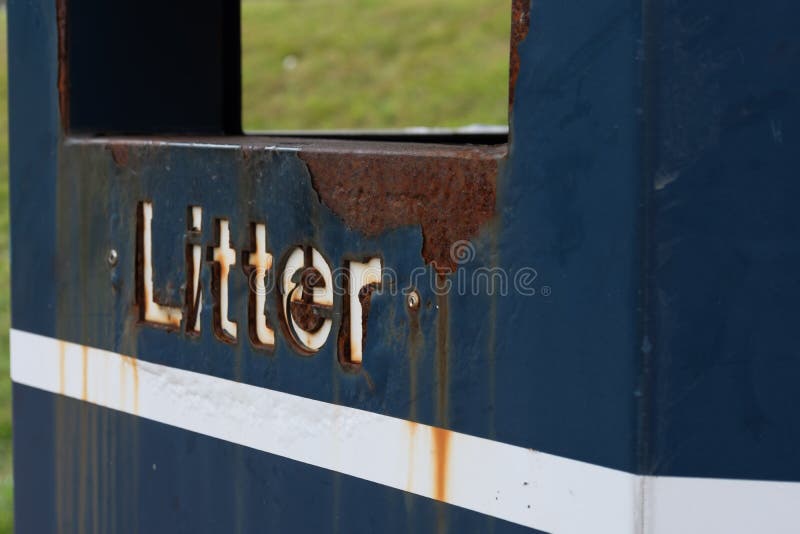 Rusted Litter Sign on Blue Bin Stock Photo - Image of nature, garbage ...