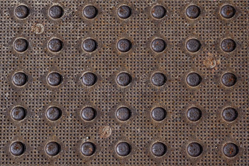 Rusted Metal Sewer Cover with Raised Dots Texture Stock Photo - Image ...