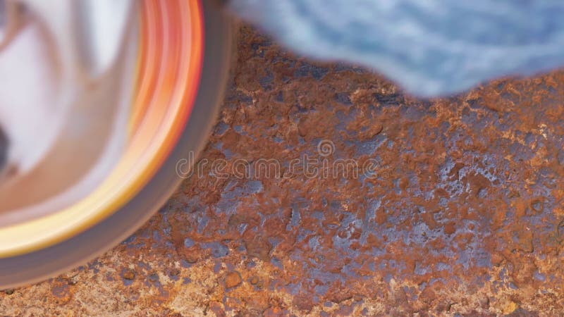 Rusted Metal Surface is Being Cleaned with Angle Grinder and a Flap ...