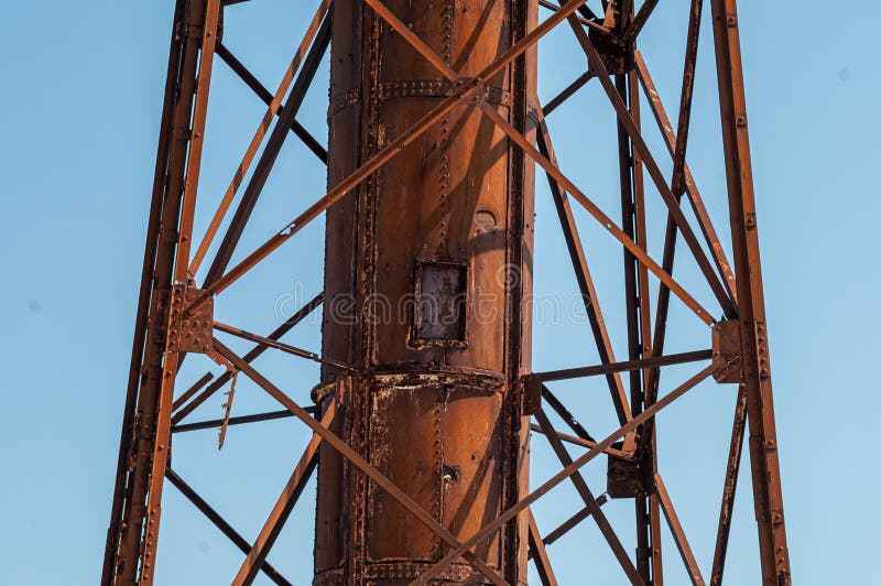 Rusted Metal Tower Against Blue Sky - Industrial Decay Stock Image ...