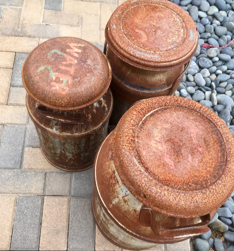 Rusty Milk Cans stock photo. Image of rusty, character - 149631478