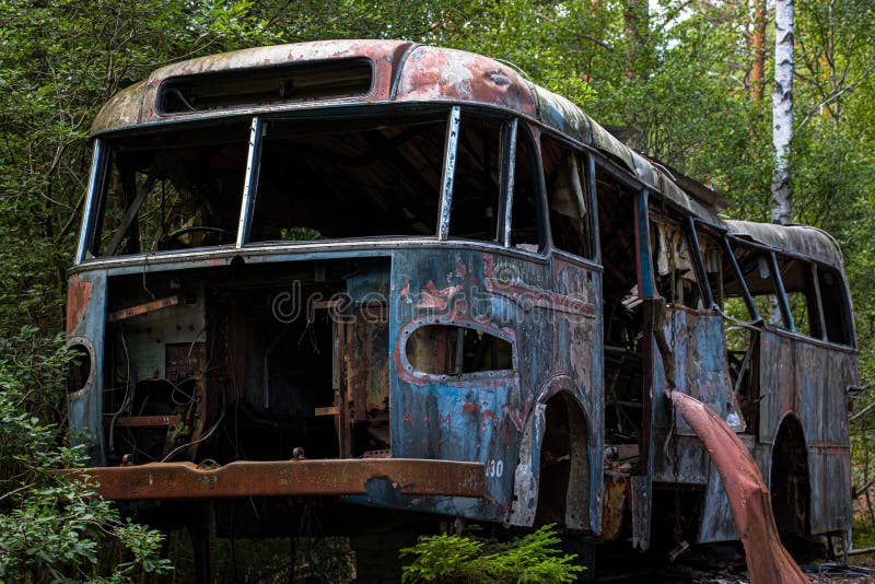Rusted and Old Bus Abandoned in the Middle of the Forest Stock Photo ...