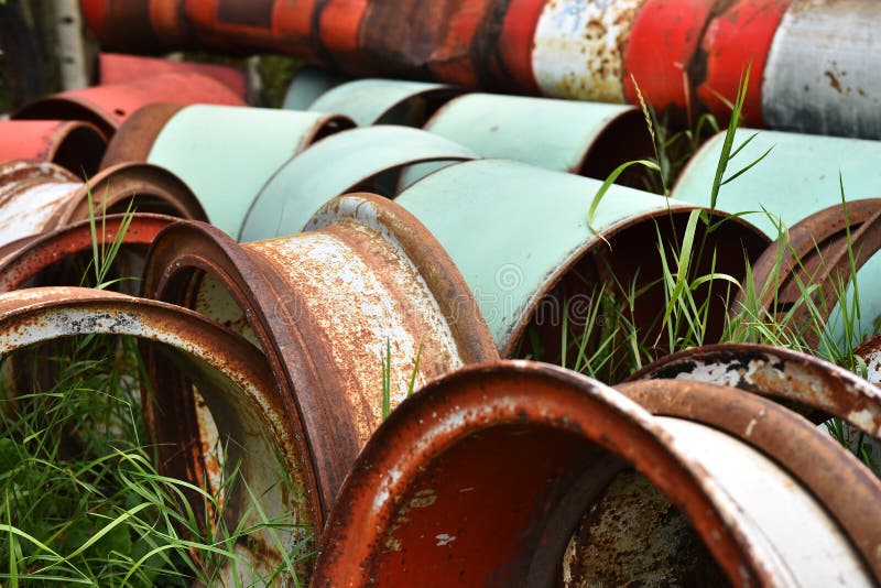 Rusted Old Car Rims and Scrap Metal Stock Photo - Image of container ...