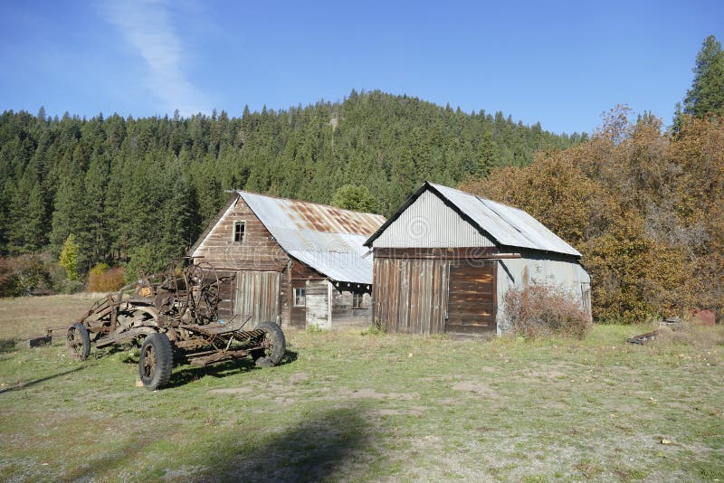 Rusted Old Farming Equipment and Old Barns Stock Image - Image of ...
