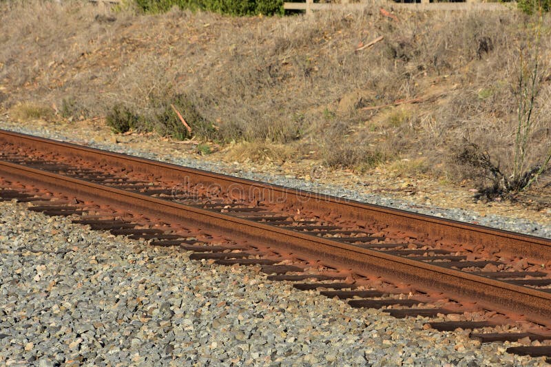 Rusted Railway Tracks Heading Off into the Distance Stock Image - Image ...