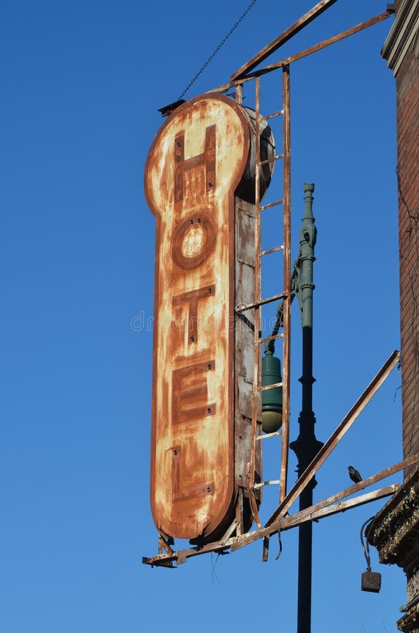 Rusted sign stock image. Image of hotel, entrance, sign - 85591185