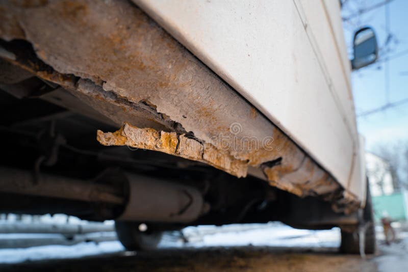 Rusted through the Threshold of a White Car Close-up. Corrosion of the ...