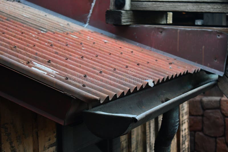 Rusted Tin Roof with Gutter Stock Image - Image of blooming, rustic ...