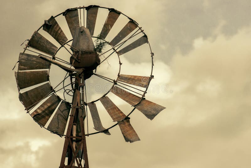 Rusted Windmill in the Countryside Stock Photo - Image of water ...