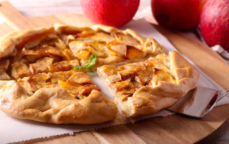 Rustic apple tart, sliced stock image. Image of homemade - 257949489