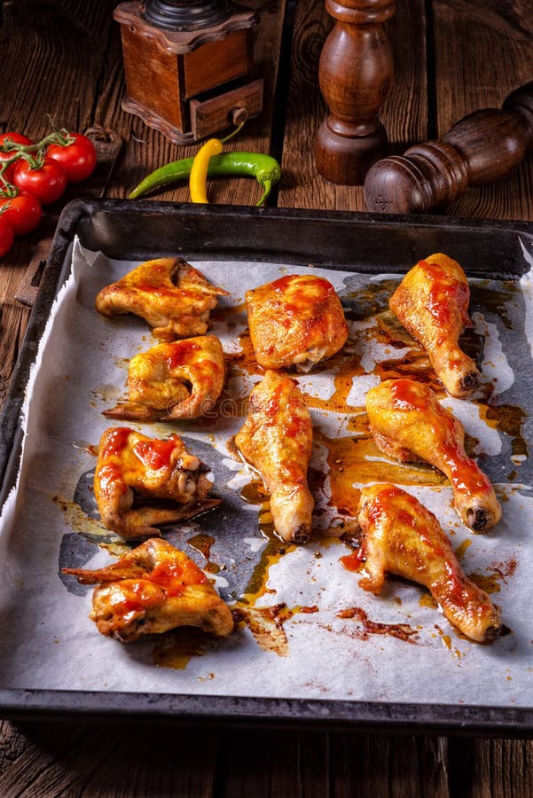 Rustic Backed Chicken Wings,legs on Baking Tray Stock Image - Image of ...