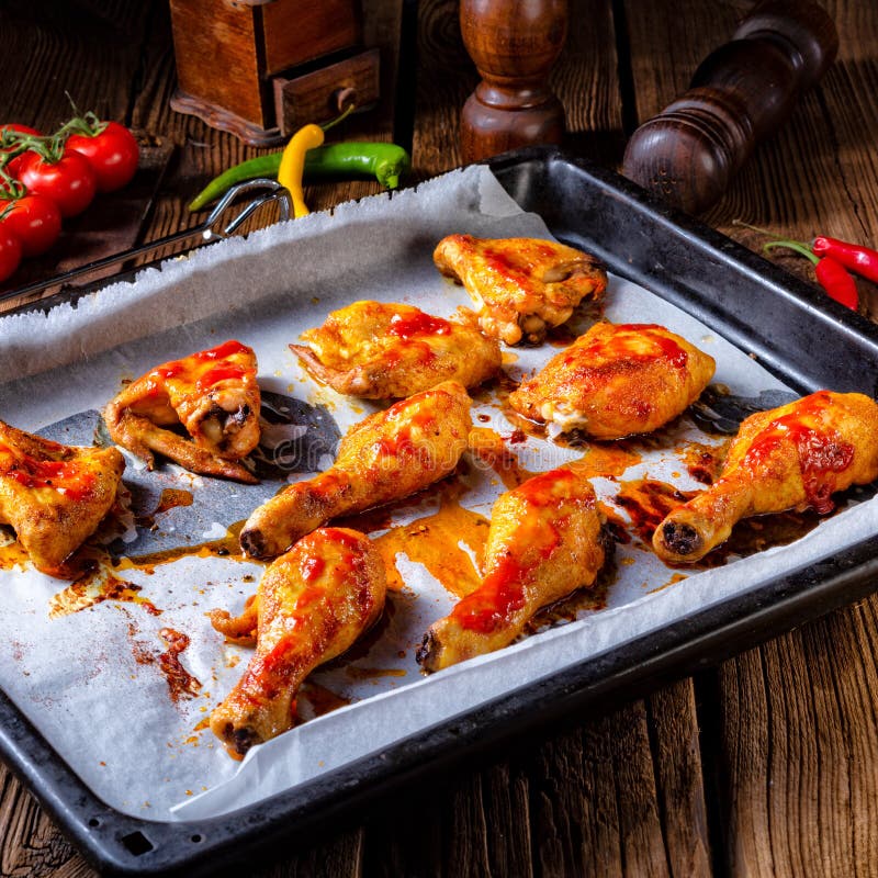 Rustic Backed Chicken Wings,legs on Baking Tray Stock Image - Image of ...