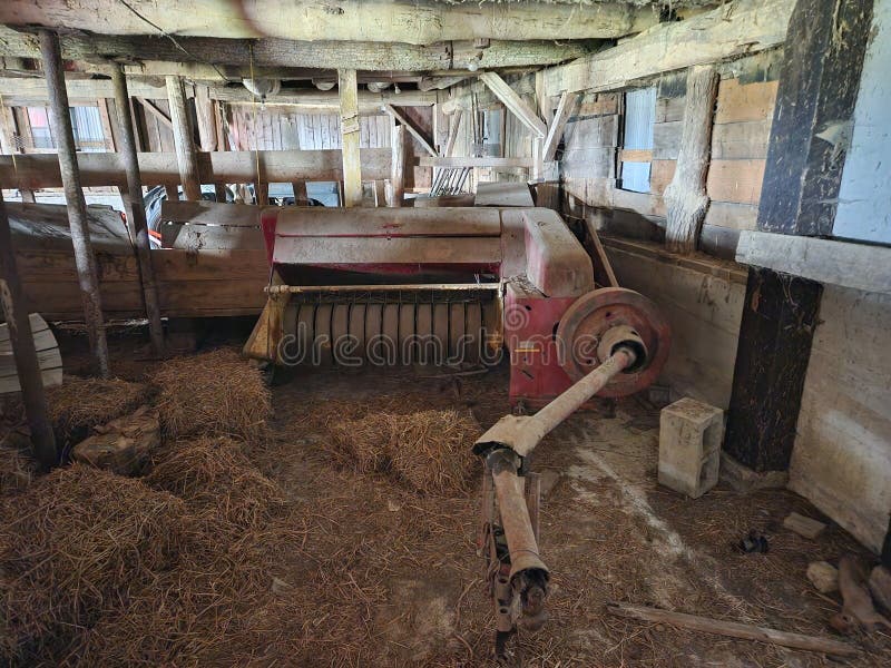 Rustic Barn with Stack of Hay Bales in the Storage Area Stock Image ...