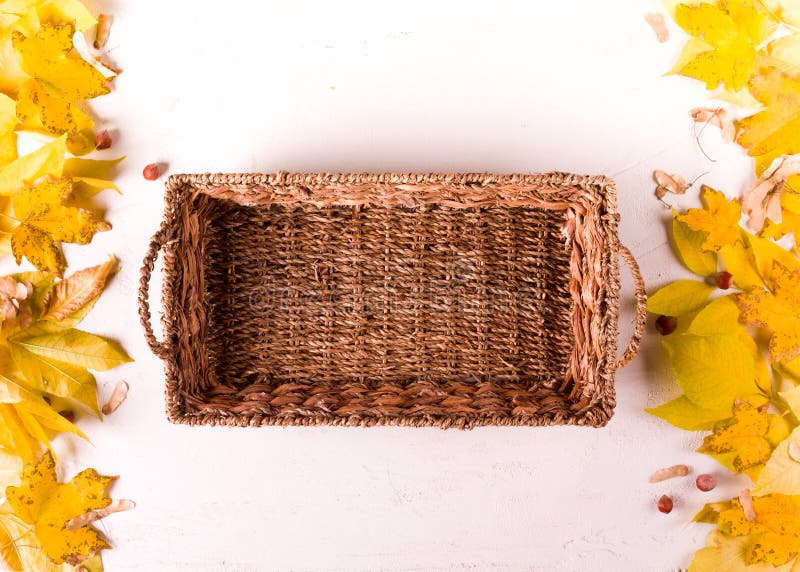 Rustic Basket, Autumn Leaf Border on White Background, Top View Stock ...