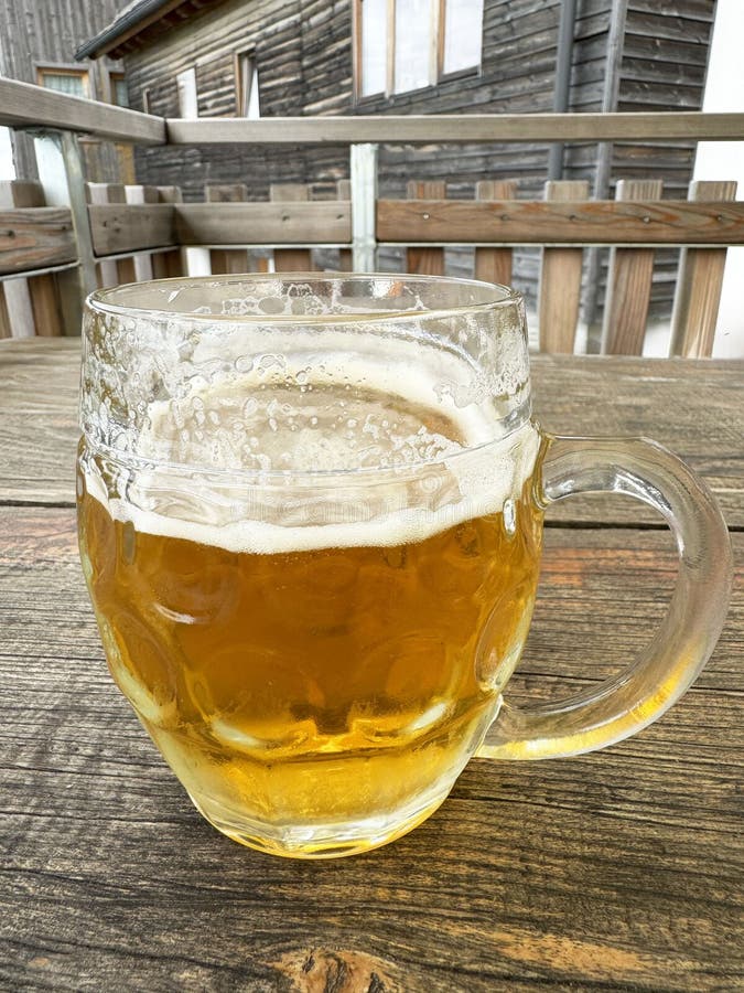 Rustic Beer Stein in Outdoor Setting on Wooden Table Stock Photo ...