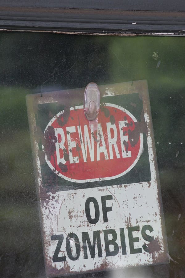 Rustic Beware of Zombies Sign Found Posted on Dusty Window Stock Image ...