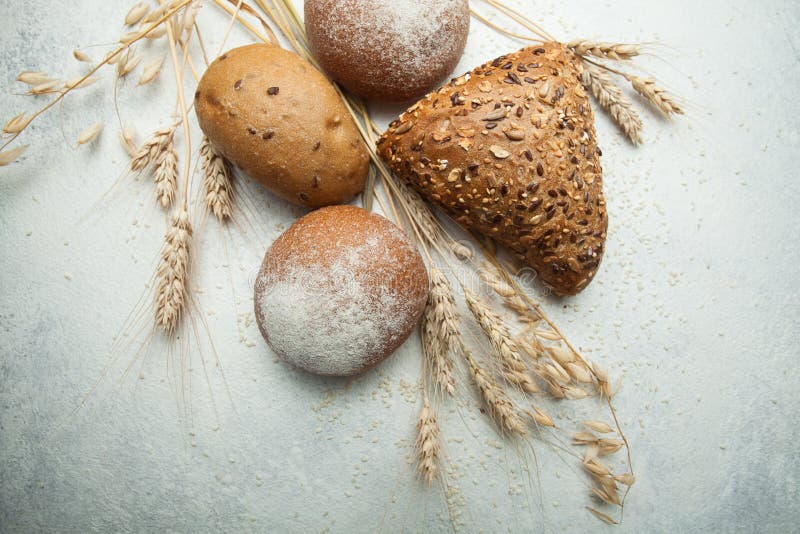 Rustic Black Bread and Rye with Wheat on an Old Antique White Table ...