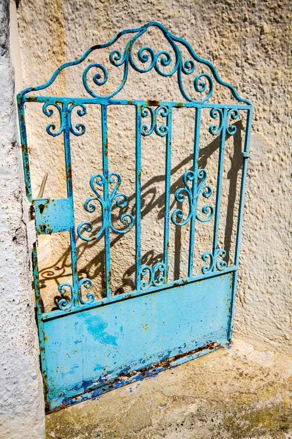 Rustic blue metal gate stock photo. Image of decoration - 99874224