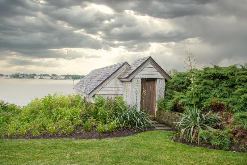 Old boat house on a river stock image. Image of shore - 190067253