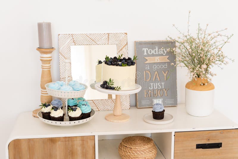 Rustic, Boho Candy Bar. Table with Cake, Cupcakes and Different Sweets ...