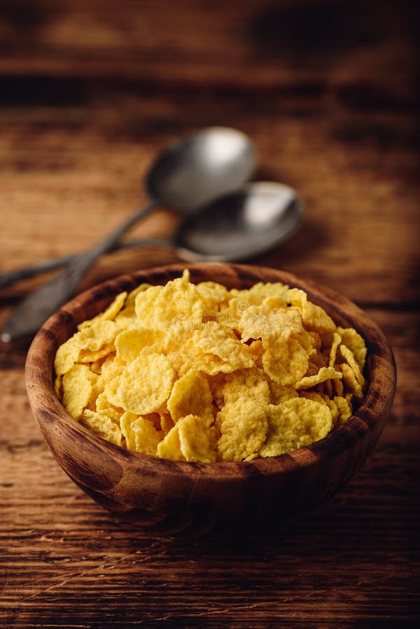 Rustic Bowl of Corn Flakes with Spoons Stock Image - Image of food ...