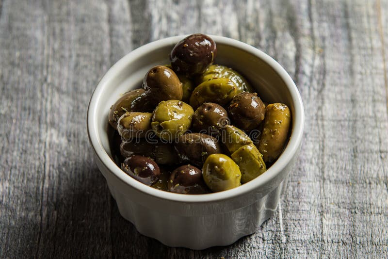 Rustic Bowl of Mixed Olives on Wood Stock Image - Image of small, close ...