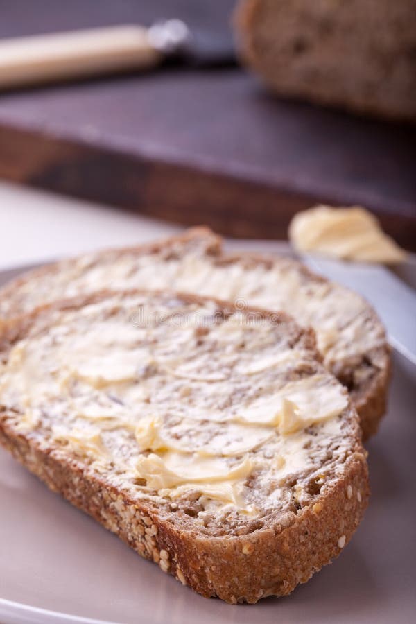 Rustic Bread and Butter stock photo. Image of food, plate - 31061104