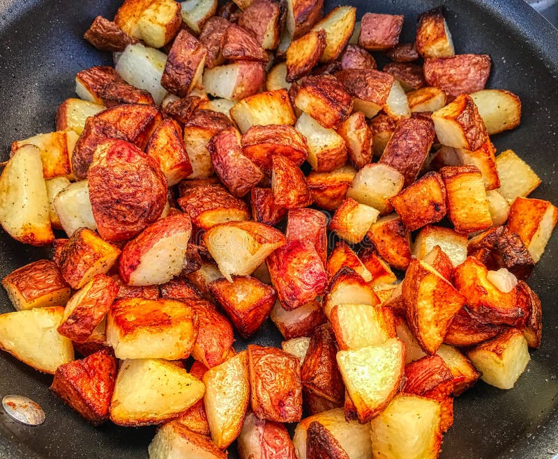 Rustic Breakfast - Large Pieces of Potatoes Fried in a Pan Stock Image ...