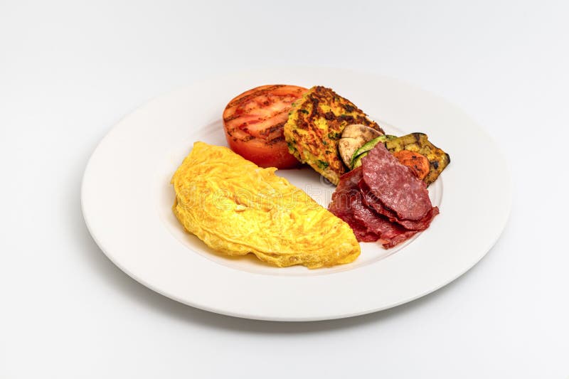 Rustic Breakfast Plate with Fried Eggs, Grilled Vegetables, and Turkey ...