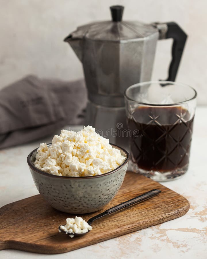 Rustic Breakfast Scene with Crumbly Cottage Cheese and Robust Black ...