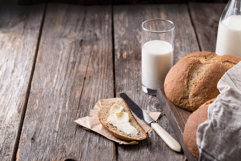 Rustic Breakfast with Wholegrain Bread, Milk and Butter Stock Image ...