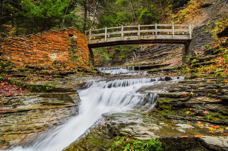 Rustic Bridge Over Stream stock photo. Image of shale - 41364048