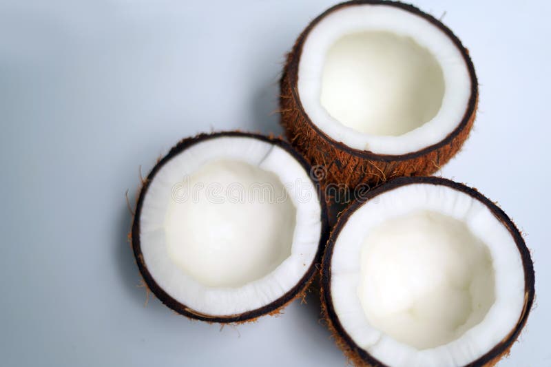 Rustic Brown Coconut Lying on White Table. Stock Photo - Image of fruit ...