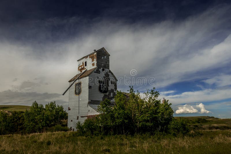 Rustic Buildings and Grain Elevator Stand in What Used To Be the Town ...