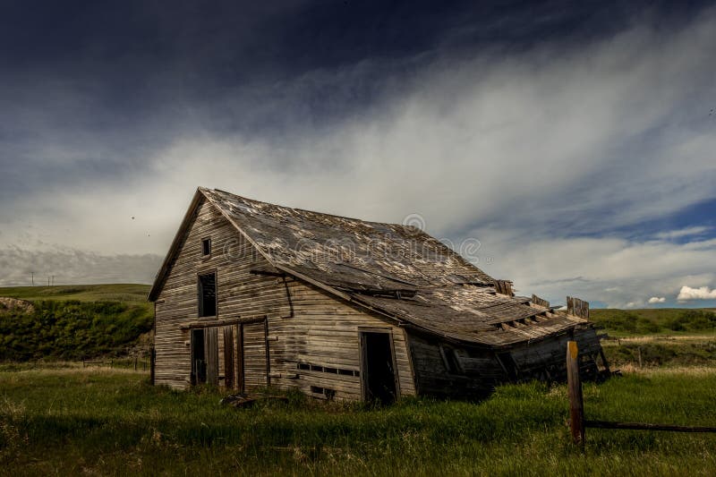 Rustic Buildings and Grain Elevator Stand in What Used To Be the Town ...