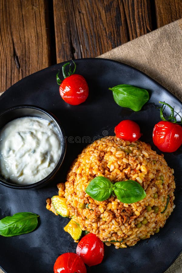 A Rustic Bulgur Fried with Minced Meat and Vegetables Stock Image ...