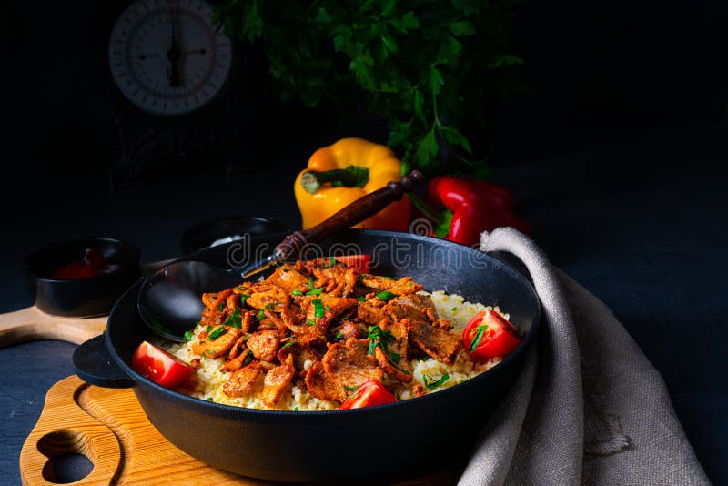 Rustic Bulgur Pans with Gratinated Gyros and Yoghurt Stock Image ...