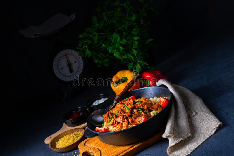 Rustic Bulgur Pans with Gratinated Gyros and Yoghurt Stock Photo ...