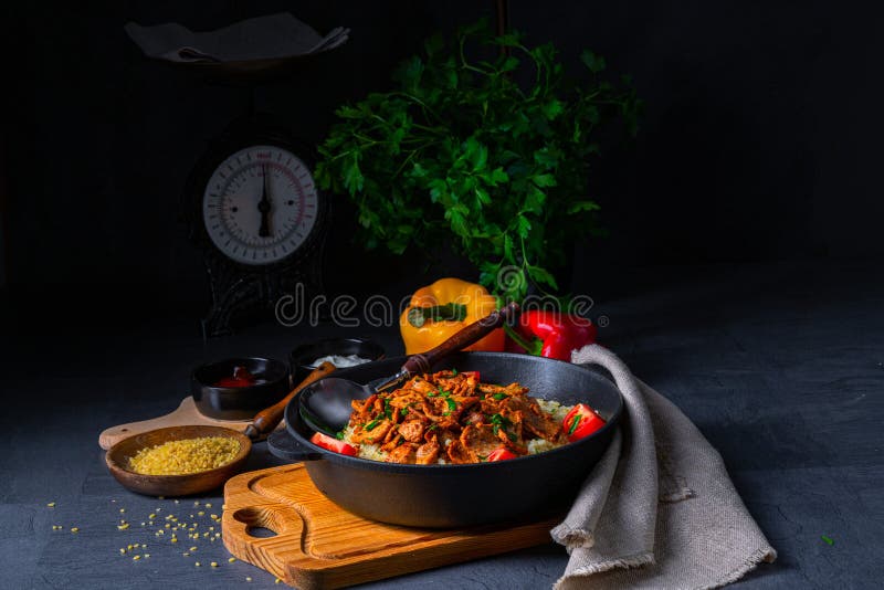 Rustic Bulgur Pans with Gratinated Gyros and Yoghurt Stock Photo ...
