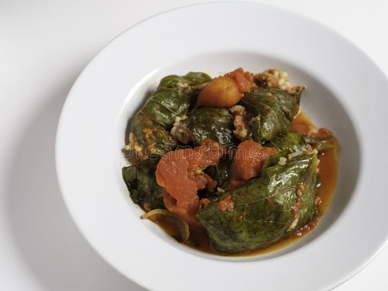 Rustic Cabbage Wrap with Ground Beef and Rice Cooked in Red Tomato ...