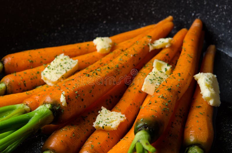 Rustic carrots in a pan stock image. Image of nutrition - 78708881