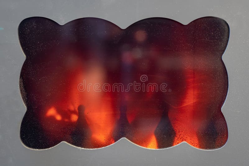 Rustic Cast Iron Stove Window Where You Can See the Fire Burning Inside ...